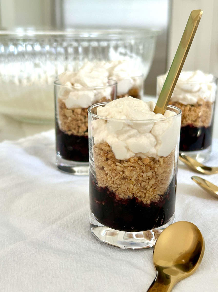 Blueberry and oat crumble verrine with maple whipped cream